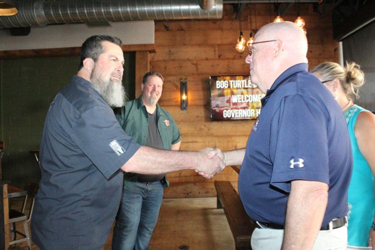 Gov. Hogan visits Bog Turtle Brewery, Hatchers on Main | Business ...