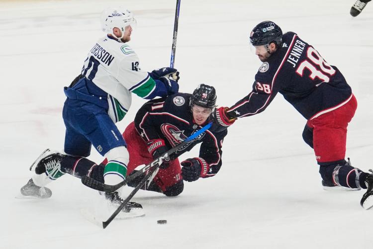 Blue Jackets beat skidding Canucks 4-1 behind Marchenko and Johnson ...
