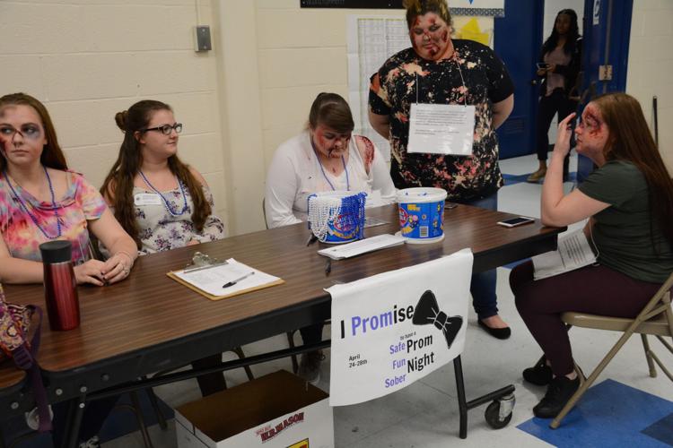 Mock car crash warns NEHS students about dangers of drunk driving ...