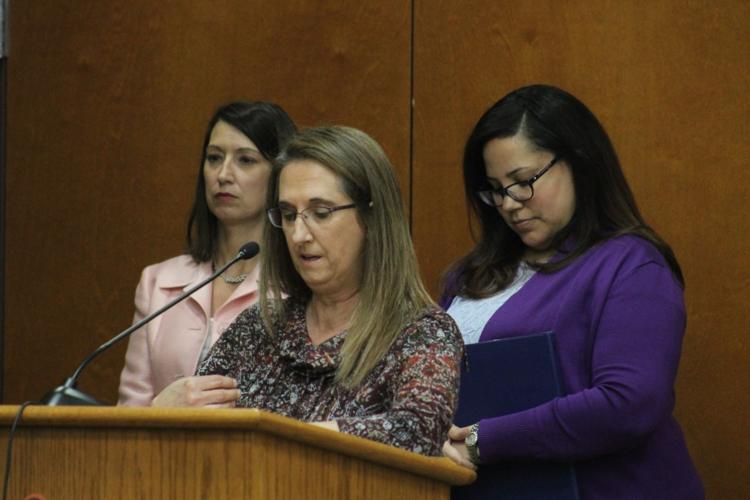 Advocates push to maintain funding for social worker positions | Local ...