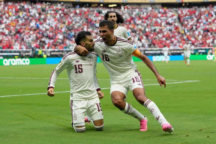 Spain wins its World Cup group, beating Uruguay 1-0 as Muslera’s error ...