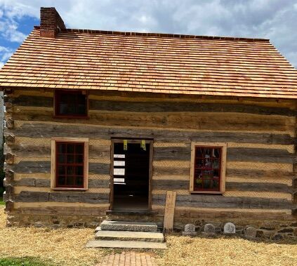Dedication ceremony held in Elkton for replica of historic log cabin ...