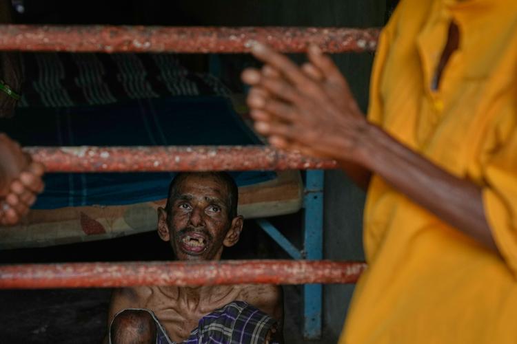 Survivors from a burned Sri Lankan nursing home relocate, in photos ...