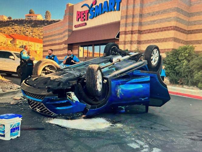 Driver hits wrong pedal, takes out landscape, flips car in front of ...