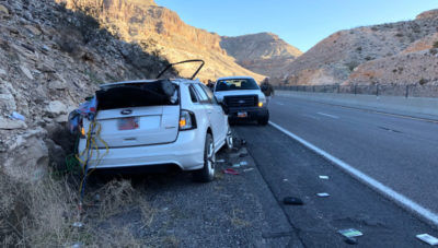 Driver transported after SUV crashes into rock wall, rolls while ...