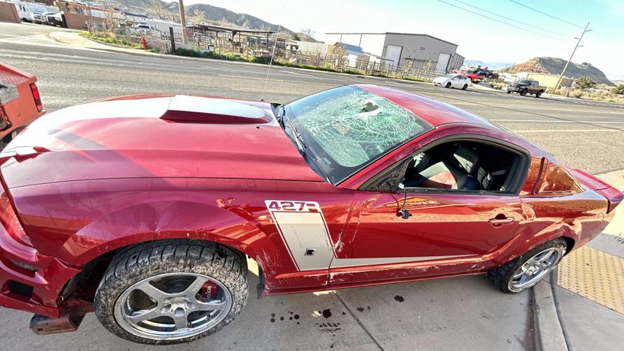 Modified Mustang ends up on its side off Washington City road | Local ...