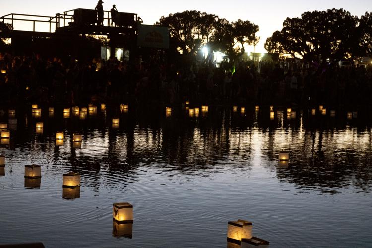 ‘A beautiful night’: Hopes and wishes set sail on candlelit lake at ...