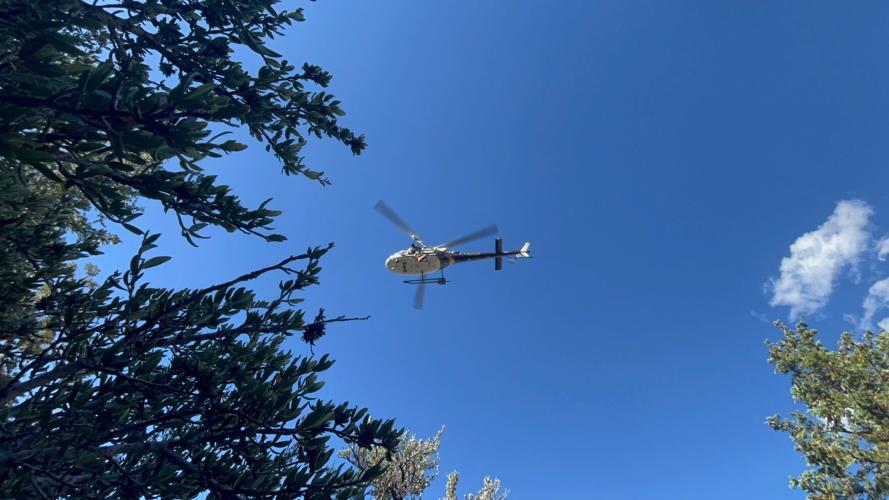 Helicopter crew rescues 2 stranded hikers in Iron County, hoists 1 injured hiker the next day ...
