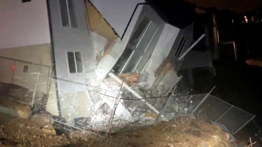 2 empty suburban Utah homes collapse down hill | Local News ...