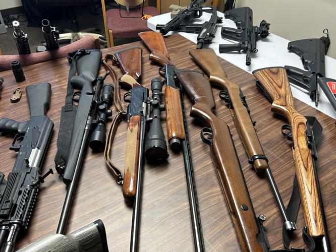 2 suspected drug dealers arrested in Cedar City raid; dozens of guns ...