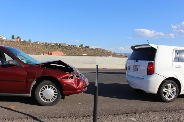 Driver following too close rear ends car as traffic backs up near I-15 ...