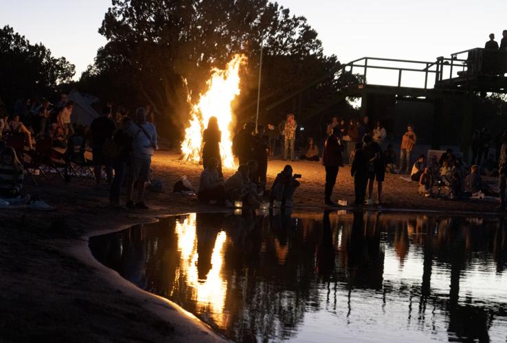 ‘A beautiful night’: Hopes and wishes set sail on candlelit lake at ...