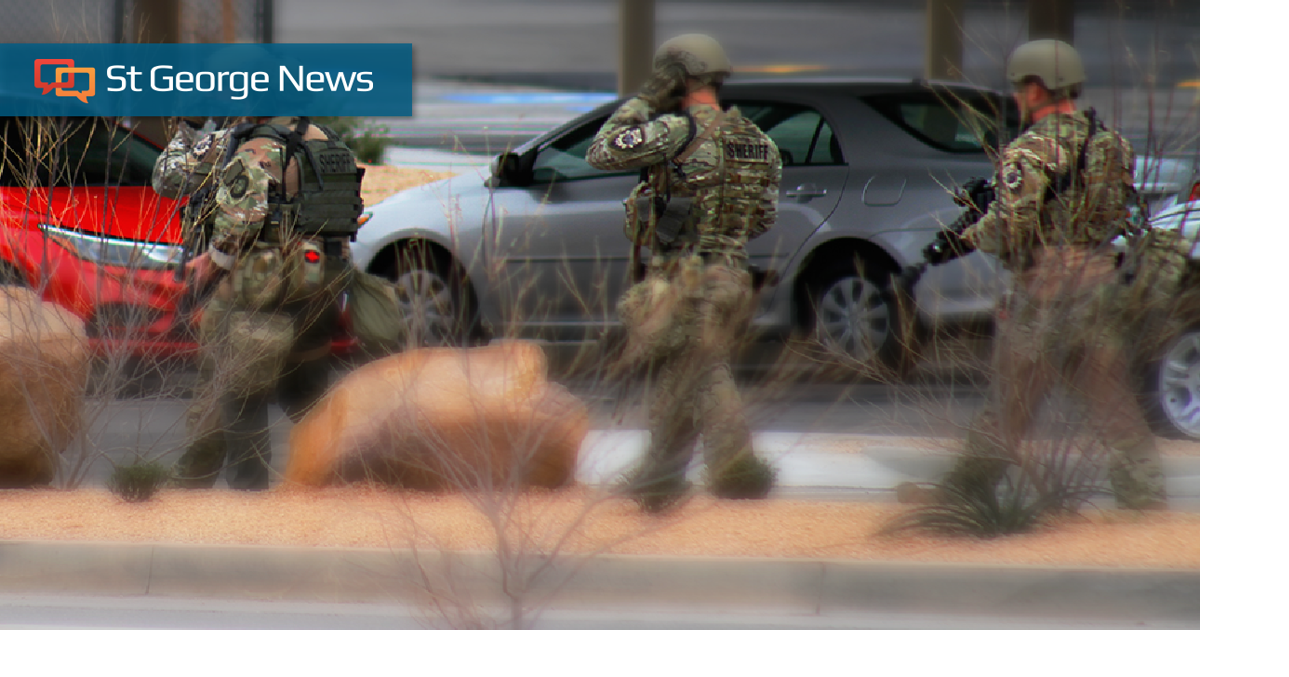 Man wanted on misdemeanor warrant surrenders to SWAT team after hiding ...