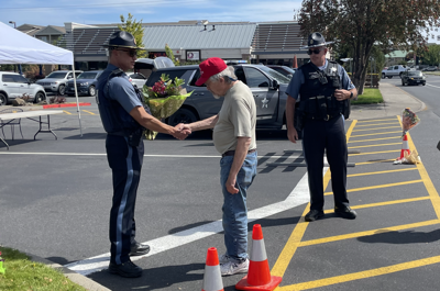 VIDEO: Oregon trooper comforts man leaving flowers for Bend Safeway ...