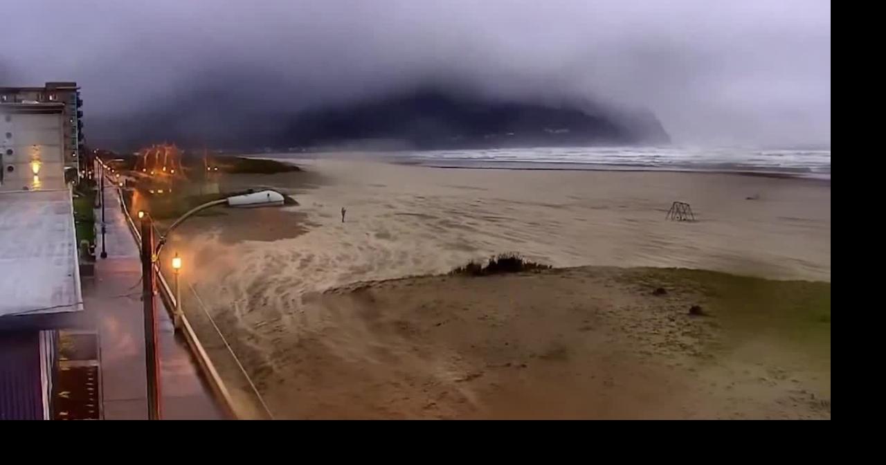 Oregon coastal beach sand looks like a flowing river during strong ...