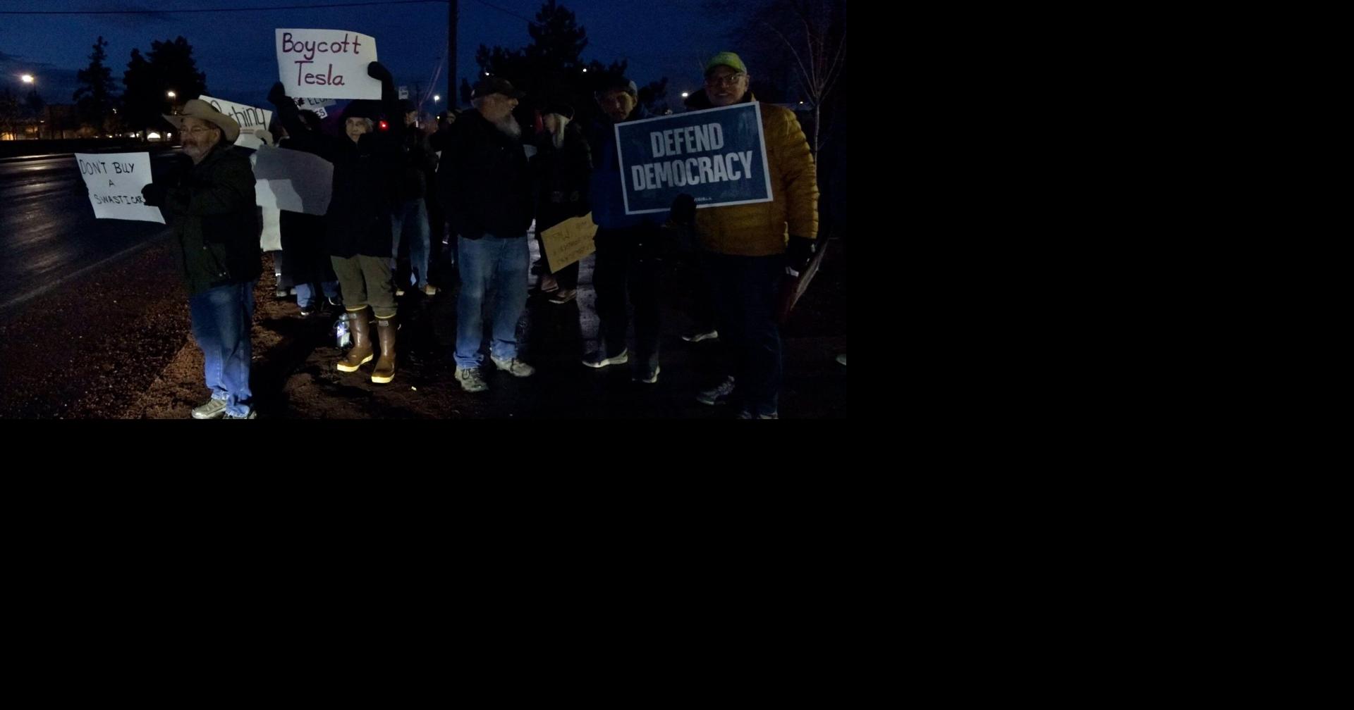 Protesters rally at Bend Tesla dealership against Elon Musk | Local ...