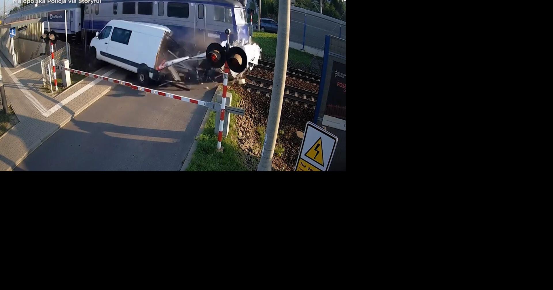 Train hits van stuck at railway crossing and the driver survives ...