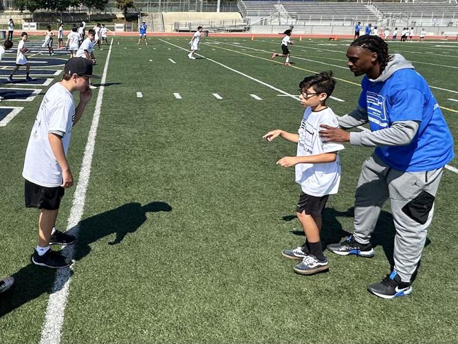 Nearly 150 attend camp with current, former NFL players as coaches ...
