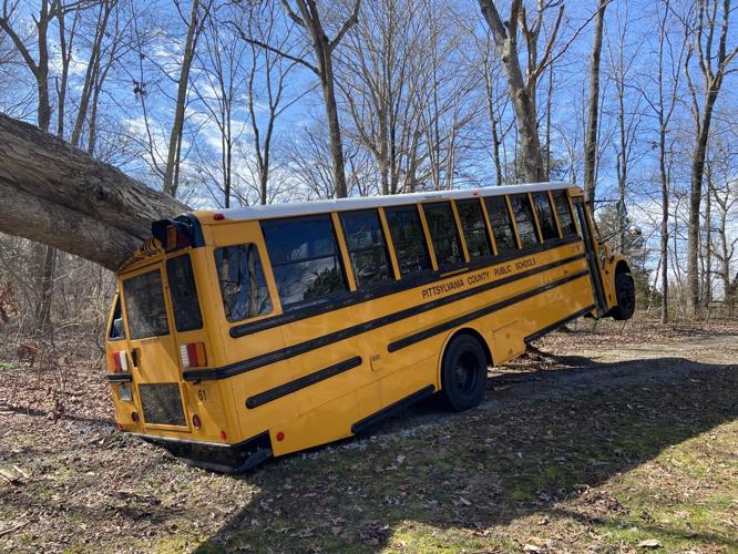 Pittsylvania County school bus remains suspended mid-air between ice ...