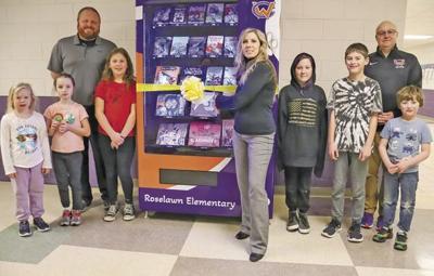 Roselawn Elementary students book it to new vending machine | Chetek ...