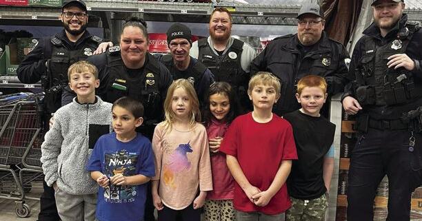 Children pair up with Chetek PD during Shop with a Cop event ...