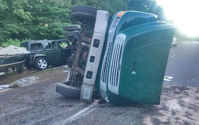 Truck hauling U.S. mail tips on Hwy. 53 near New Auburn | Community ...