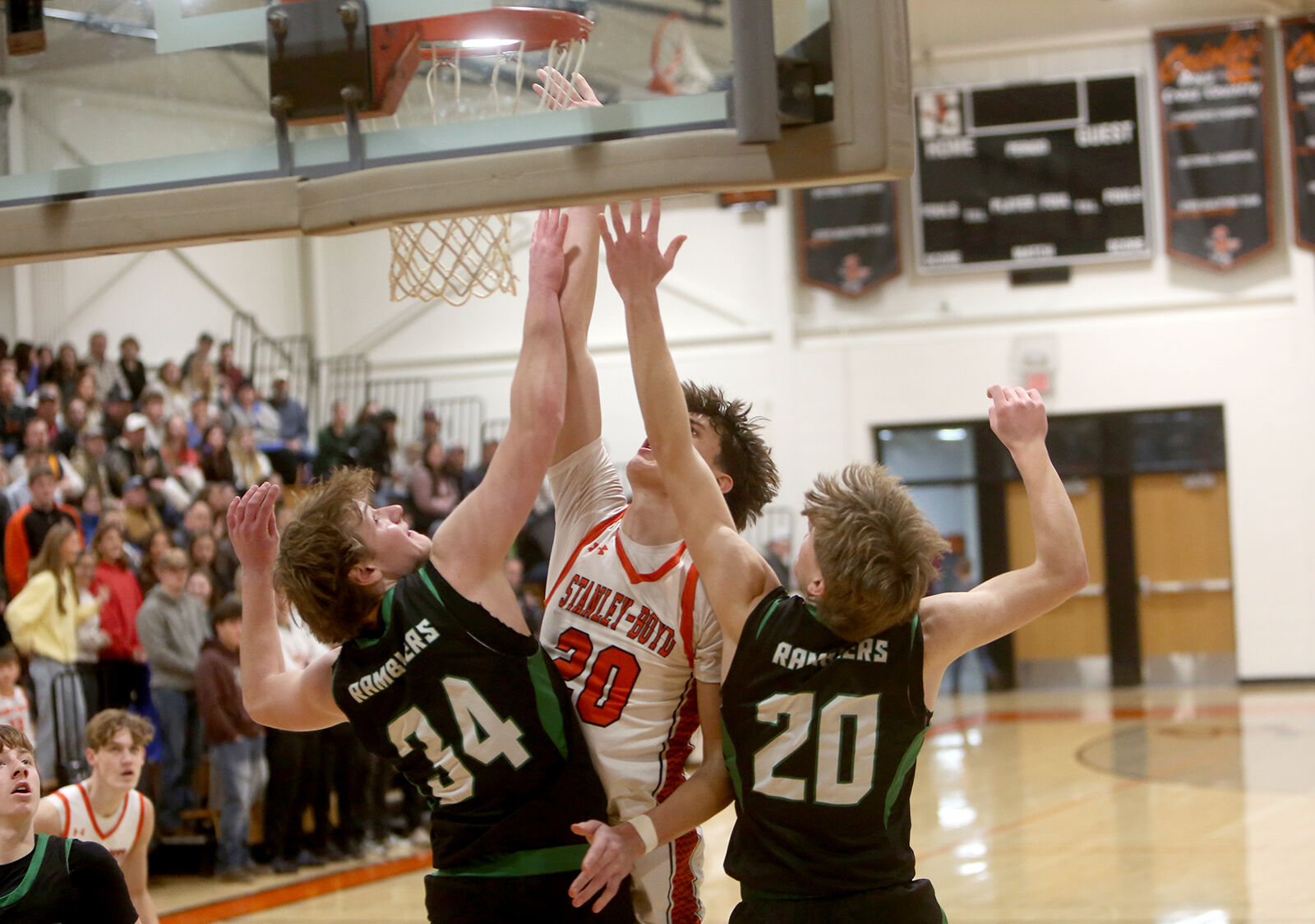 IN PHOTOS: Stanley-Boyd boys basketball battles Regis