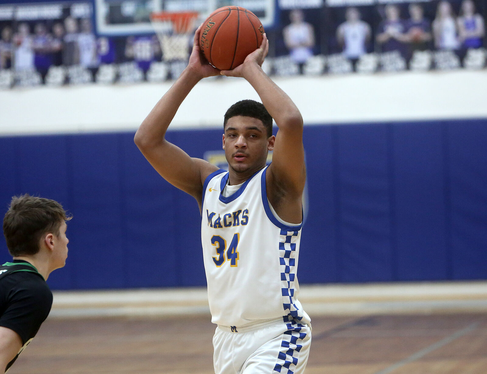 IN PHOTOS: McDonell boys basketball battles Eau Claire Regis