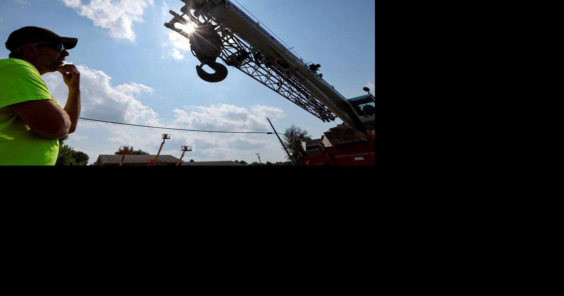 Crane operator does the heavy lifting in new construction