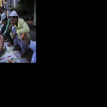 How do Muslims break their fast?