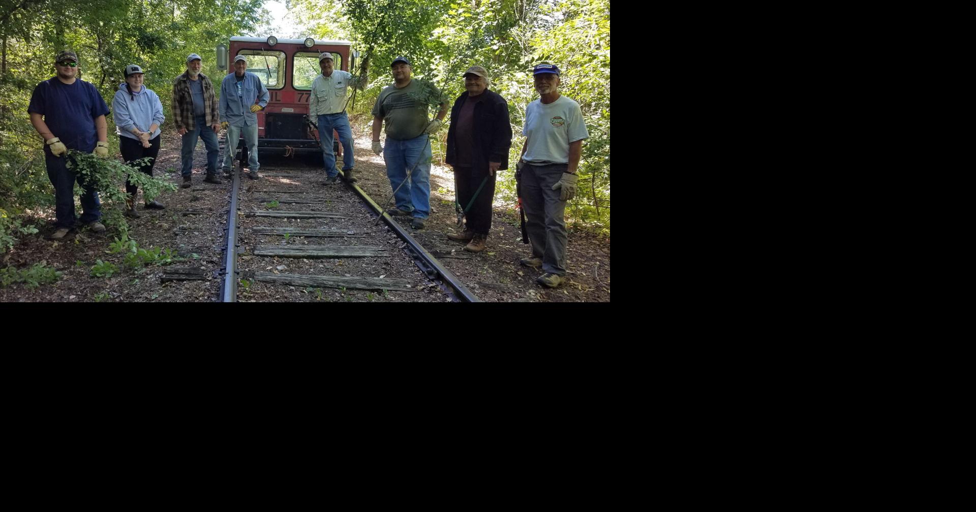 Groups clear railroad tracks before rides