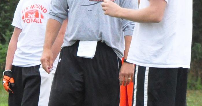 Lew named head football coach