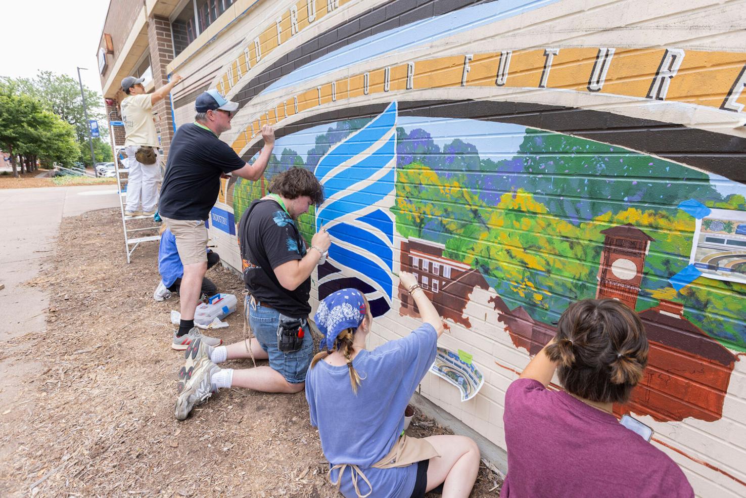 Students, staff help turn community into a canvas at mural event