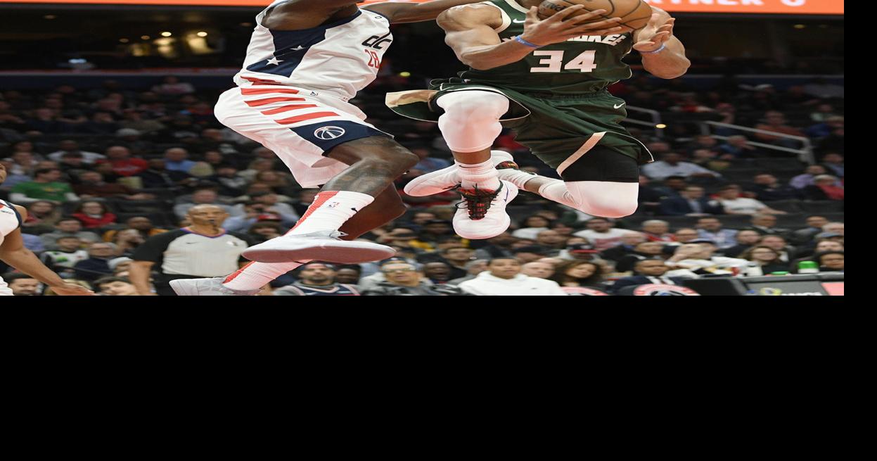 Khris Middleton pours in 40 points as Bucks tip Wizards in overtime