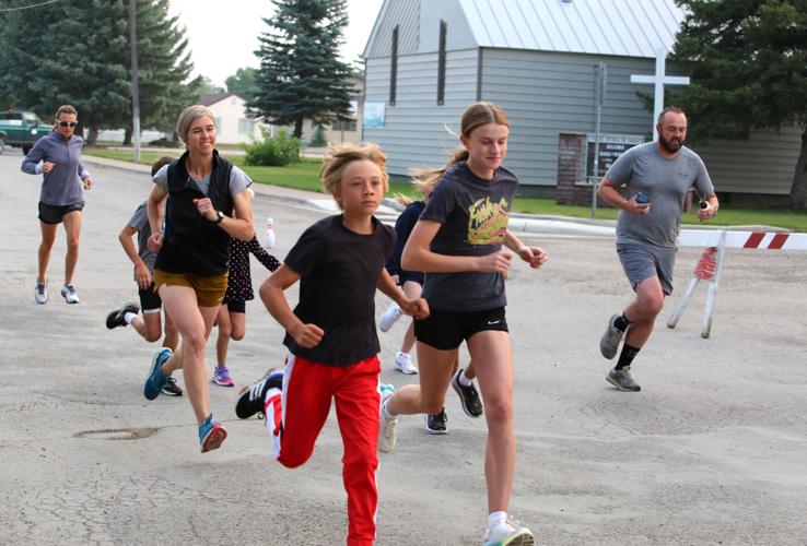 Runners up early for Swim Day fun run | News | choteauacantha.com