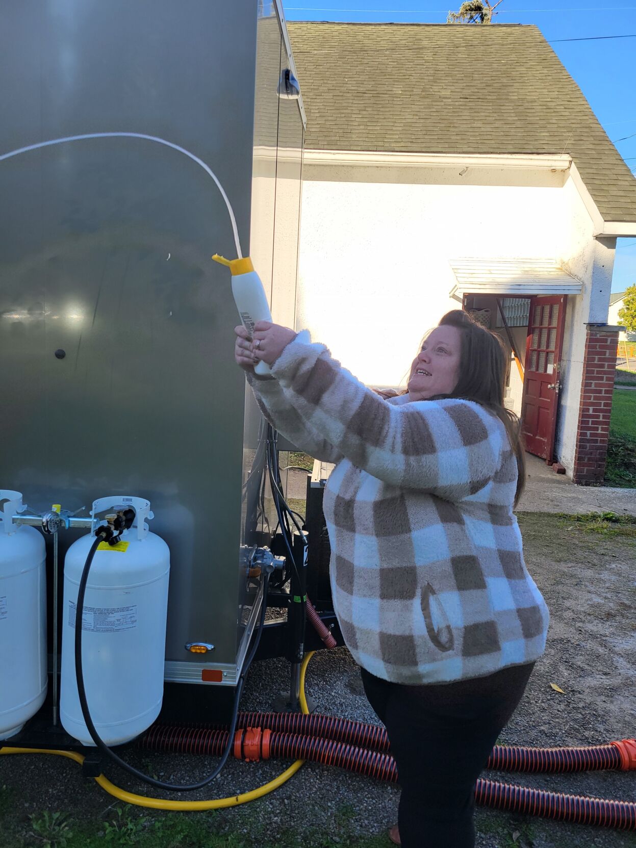 Mayor Blanton christens Soap-n-Hope with shampoo | Community ...