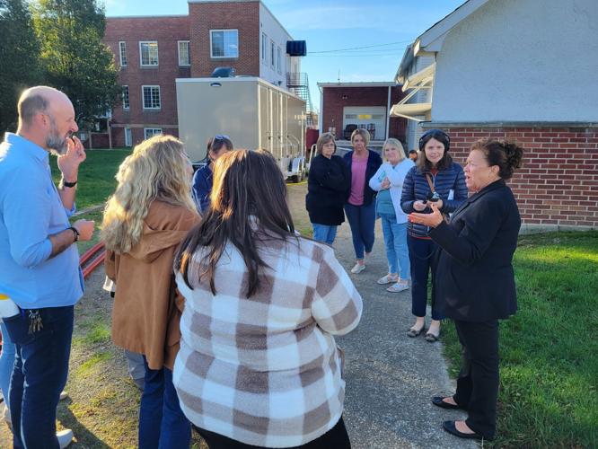 Mayor Blanton christens Soap-n-Hope with shampoo | Community ...