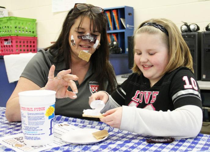 Students, families attend Camp Read S'More Literacy Night | News ...