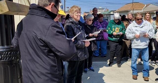 Christians embrace their faith with crosswalk on Good Friday | News ...