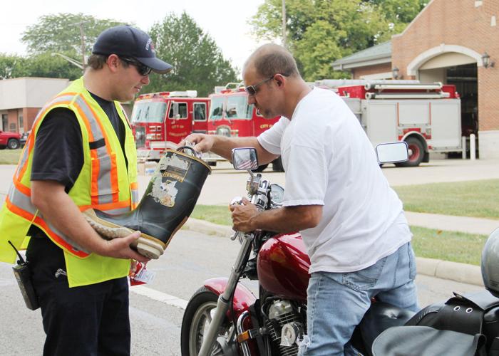 Giving It the Boot! Firefighters collect for MDA | News ...