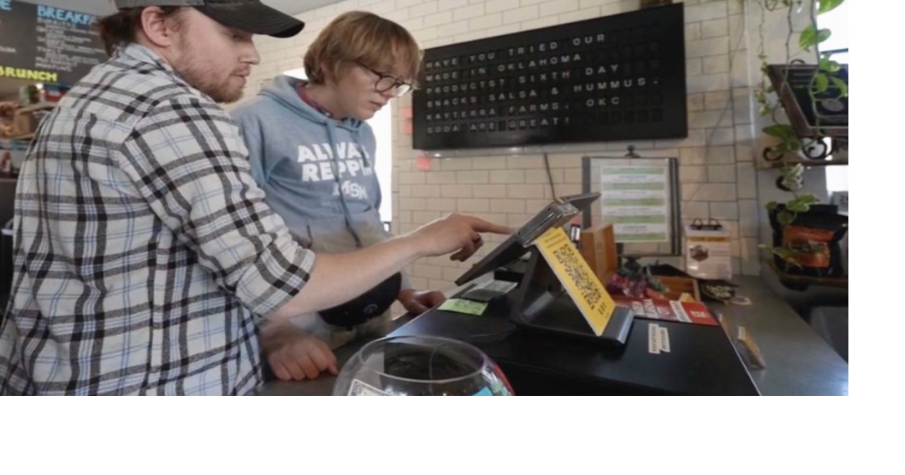 Center in this photograph is William Hefner, son of Oklahoma State ...