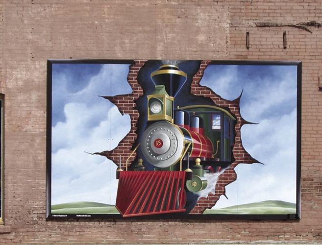 Artist behind two downtown Claremore murals talks process, inspiration ...