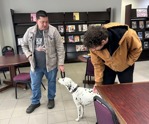 Fetch a break: Therapy dogs provide respite at RSU library during ...