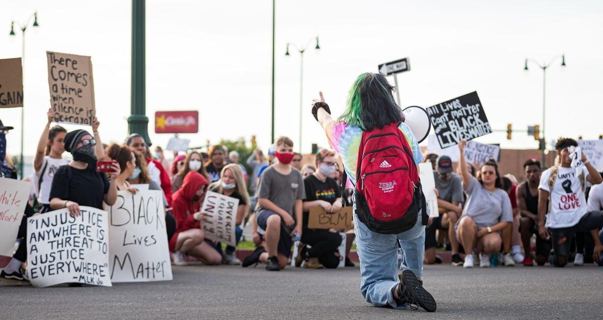 "This is what community looks like:" Teen activist leads peaceful ...