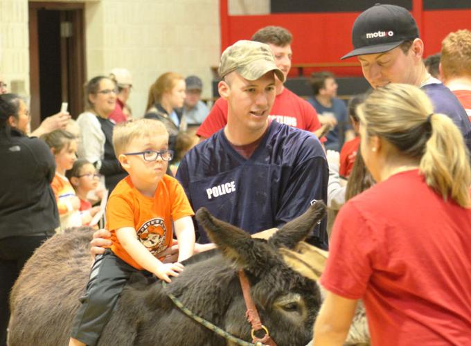 PHOTO GALLERY: Claremore firefighters dominate Donkey basketball ...