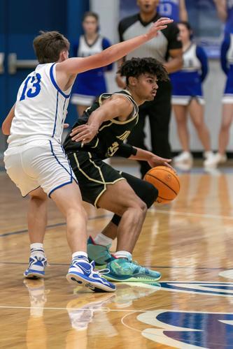 BOYS BASKETBALL: Clark posts career-highs of 31 points, 13 rebounds as ...