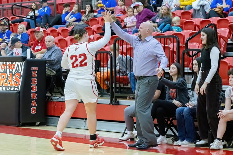 BASKETBALL: Lady Zebras earn first district win; Claremore boys wear ...