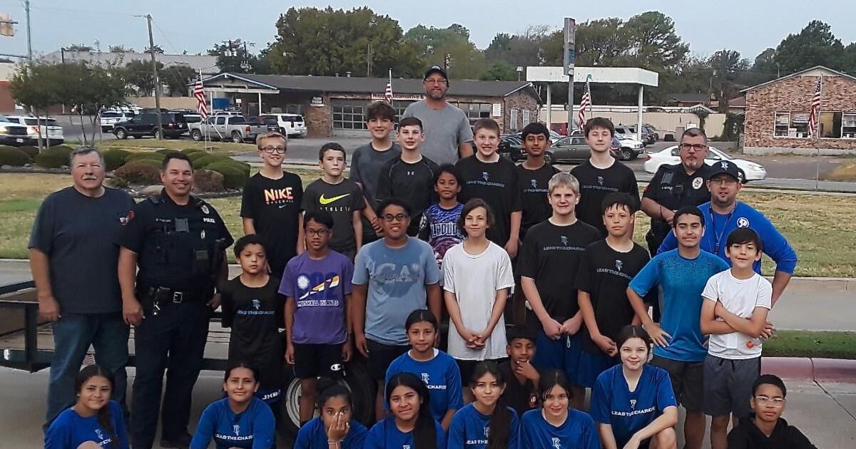 Keene Junior High athletes assist displaying U.S. flags | Local News ...