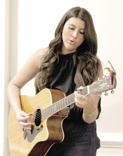 Hollis sings songs of heartbreak, speaks of faith and resilience | News ...