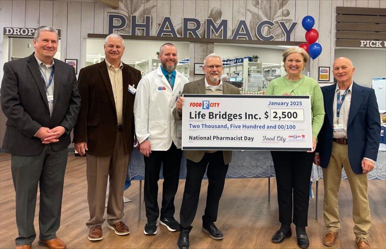 Food City Pharmacy celebrates grand opening, presents donation to Life ...